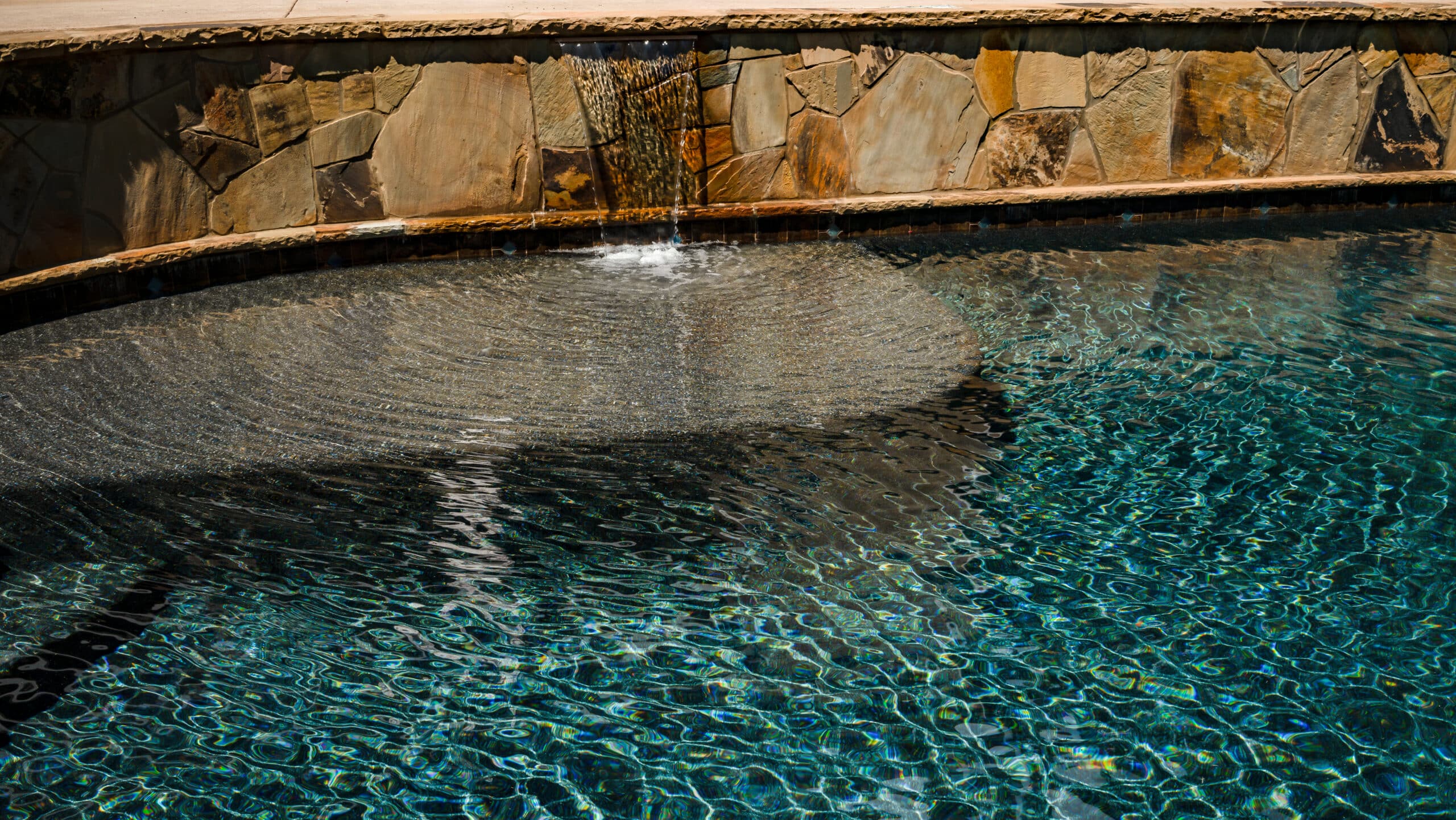Important Factors When Choosing Concrete Pool Finishes - J&M Pools